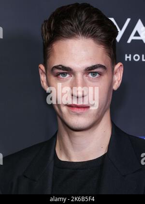 Hero Fiennes Tiffin, an English actor and model, surrounded by fans ...