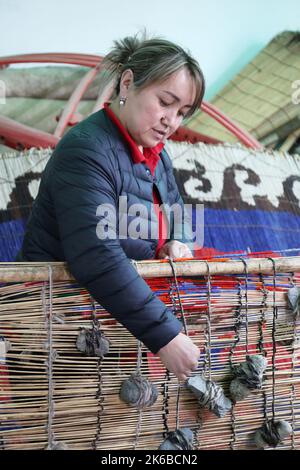Traditional felt making demonstration, Kochkor, Naryn Region ...