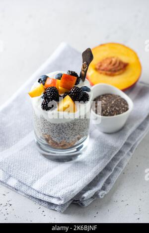 Chia pudding. Healthy vanilla chia pudding in glass with fresh ...