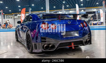 A blue Nissan GTR R35 during DAY1 World of Cars Stock Photo - Alamy