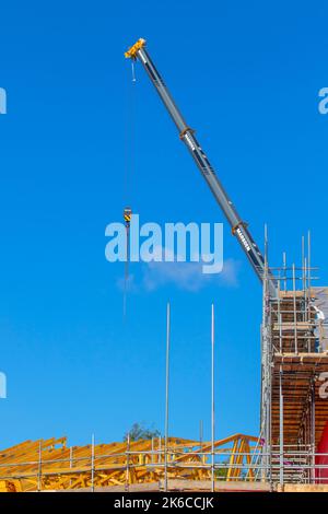 Joiners, and roofers on Morar Care Home development by Simplu UK. Ridge ...