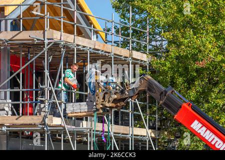 Joiners, and roofers on Morar Care Home development by Simplu UK. Ridge ...