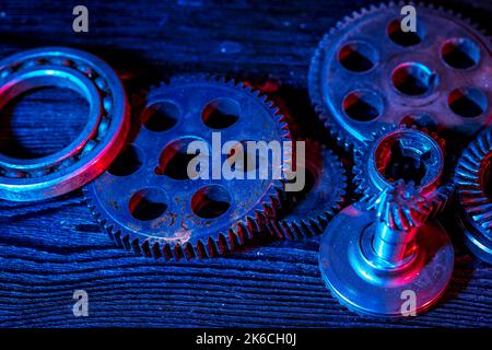 Gears. Machine part. Neon color Stock Photo - Alamy