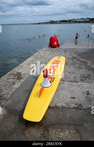 Lifeguard guard at Seapoint beach and bathing areas on the Dublin Bay ...