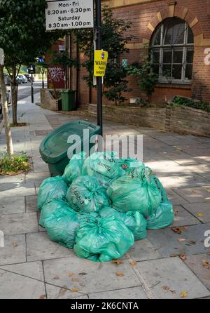 Lambeth Council green waste collection sacks piled up on the street ...