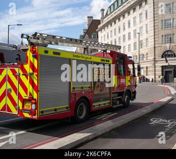 London Fire Brigade engines wait at Westminster Bridge as part of the ...