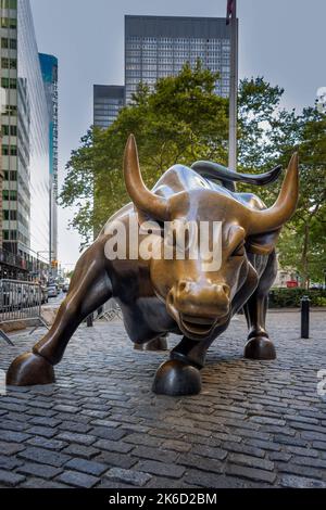 Famous Charging Bull by artist Arturo Di Modica on Broadway in New York Downtown, NY on April 14 ...