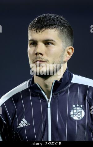 ZAGREB, CROATIA - OCTOBER 11: Dino Peric of Dinamo Zagreb in action ...