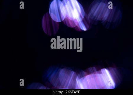 purple rainbow crystal light leaks on black background Stock Photo - Alamy