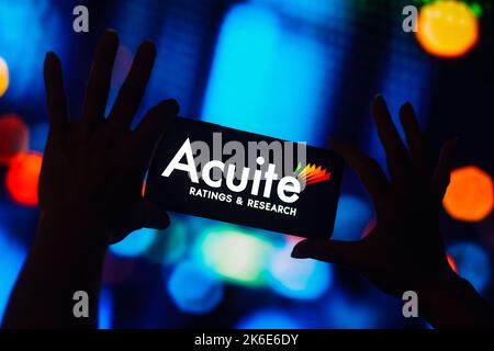 In this photo illustration, the Acuité Ratings and Research logo is ...