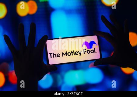 In this photo illustration, The Motley Fool Holdings Inc. logo is ...