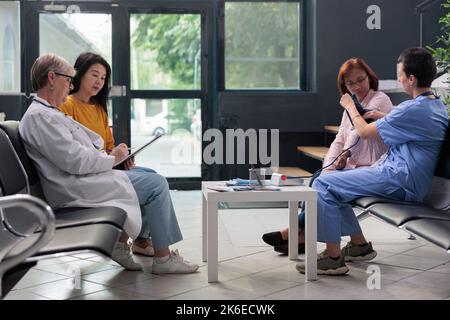 Medical assistant using tonometer instrument to measure pulse pressure ...