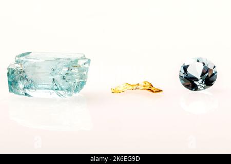 Raw aquamarine; faceted aquamarine gemstone & gold nugget mined by ...