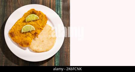 Rich fried dried fish torta - Traditional Colombian dish Stock Photo ...