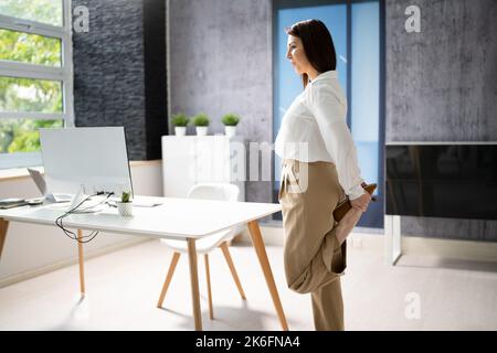 Standing Office Yoga Workout And Workout Near Business Computer Stock ...