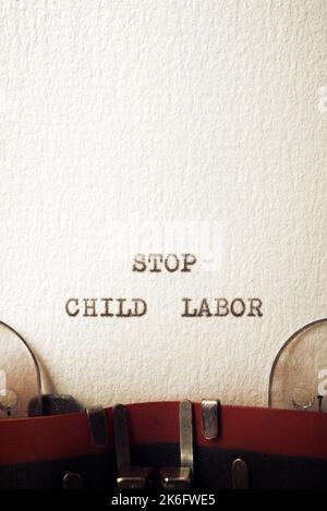 Stop child labor text written with a typewriter Stock Photo - Alamy