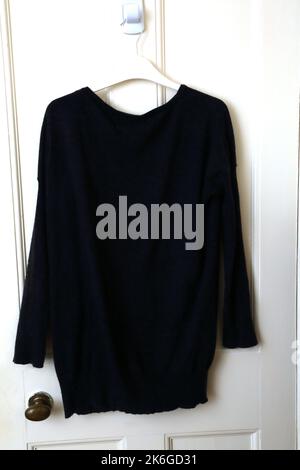 Women's Long Black jumper Stock Photo - Alamy