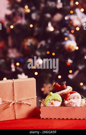 Festive holidays present - Christmas cupcakes in wooden box in front of ...