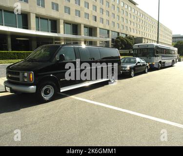 Views of Department's fleet of official vehicles outside Main State for ...