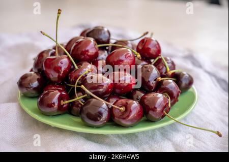 Giant french fresh ripe black cherries, new harvest, ready to eat close ...