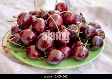 Giant french fresh ripe black cherries, new harvest, ready to eat close ...