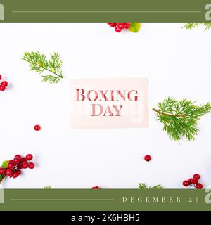 Composition of boxing day text over christmas decorations on red ...