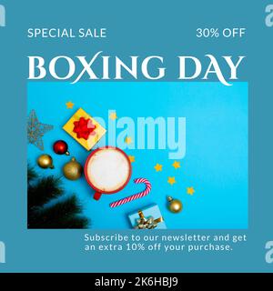 Composition of boxing day sales text over christmas decorations on ...