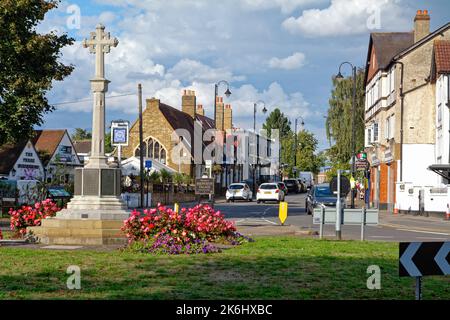 The War Memorial and the High Street at Shepperton on an sunny autumnal ...
