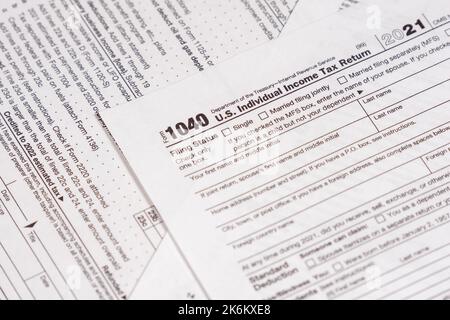 Shot of various IRS tax forms, 1040, 1120-S for sending in personal and ...