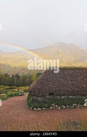Turf House with rainbow Glencoe Scotland October 2022 Stock Photo - Alamy