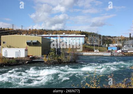 The fast flowing Yukon River running past the hydroelectric power ...