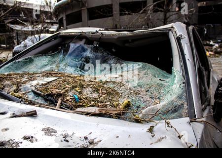 Aftermath of massive Russian missile attacks, an office building near ...