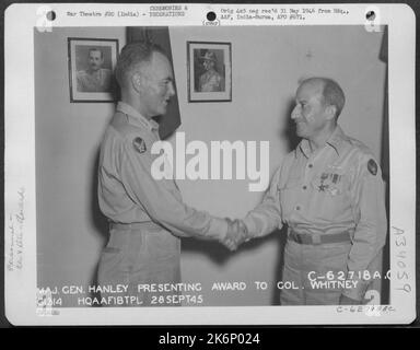 Major General Thomas J. Hanley, Jr., congratulates Colonel Brothers ...