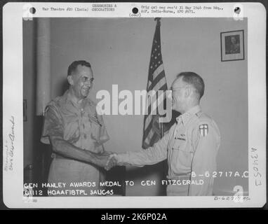 Major General Thomas J. Hanley, Jr., congratulates Colonel Donald D ...