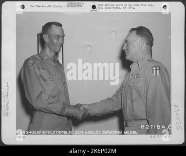 Major General Thomas J. Hanley, Jr., congratulates Colonel D.R. Hardy ...