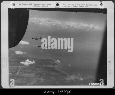Consolidated B-24 "Liberators" of the 494th Bomb Group, drop their ...