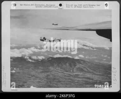 Consolidated B-24 "Liberators" of the 494th Bomb Group, drop their ...