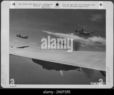 Consolidated B-24 "Liberators" of the 494th Bomb Group, drop their ...