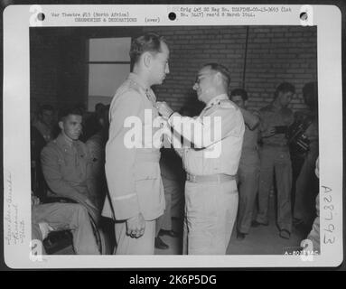 Maj. General Lewis H. Brereton presents the Air Medal to 1st Lt. Arthur ...