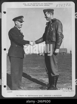Major General Nathan F. Twining Congratulates An Officer Of The 91St ...