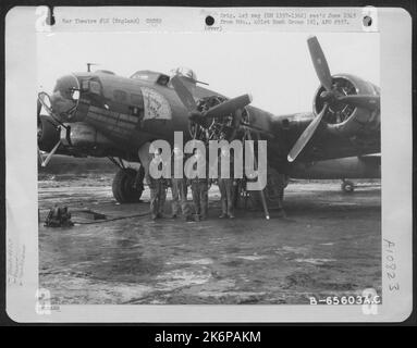 Four Crew Members Of The 401St Bomb Group In Front Of The Boeing B-17 ...