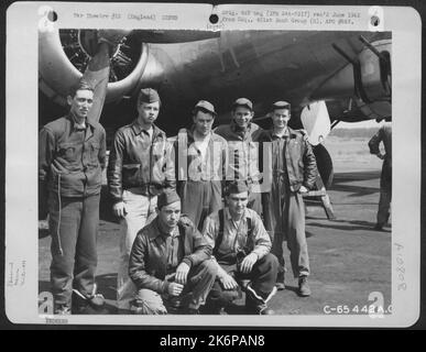A Crew Of The 401St Bomb Group Poses Beside The Boeing B-17 "Flying ...