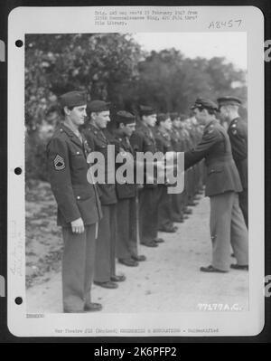 A Member Of The 390Th Bomb Group Is Congratulated After Receiving An ...