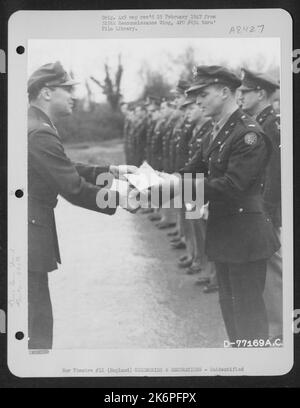 A Member Of The 390Th Bomb Group Is Congratulated After Receiving An ...