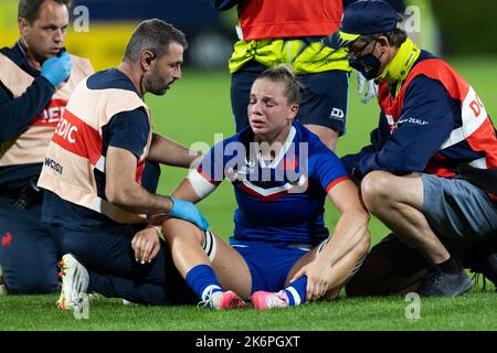 France's Romane Menager receives medical attention after an injury ...