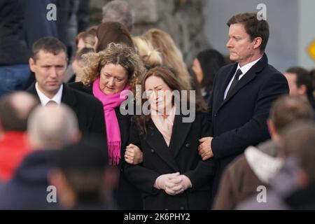 Robert Garwe's partner Aine (centre) leaves St Michael's Church, in ...