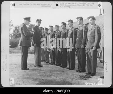 Members Of The 390Th Bomb Group, Standing In Formation, Await ...