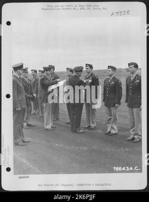 Major General Ira C. Eaker Presents An Award To An Enlisted Man Of The ...