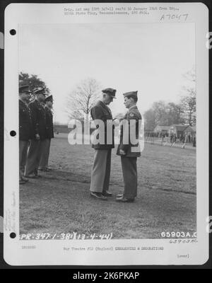 Lt. General Carl A. Spaatz presents the Distinguished Flying Cross to ...