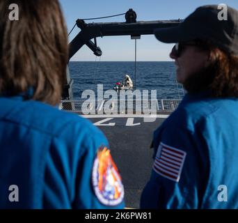NASA astronauts (from left) Kjell Lindgren and Bob Hines are pictured ...